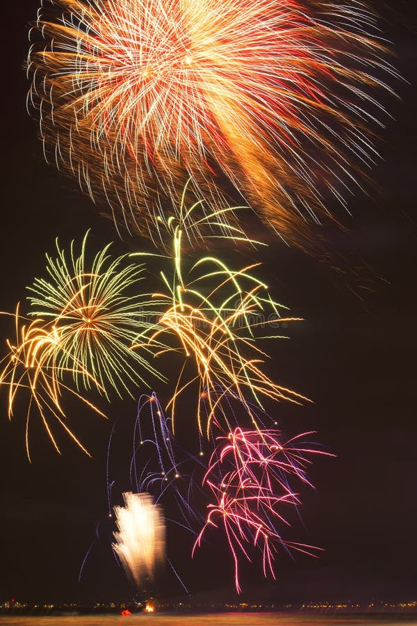 Beautiful Bright Fireworks Over the Ocean. Stock Image - Image of sand ...
