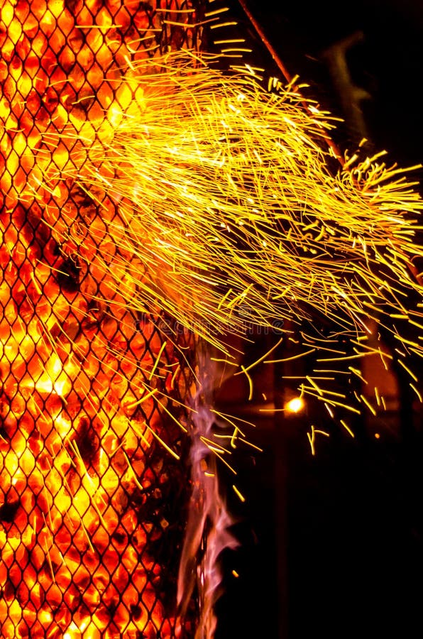 Beautiful Bright Red and Yellow Fire Sparks Flying with the Wind Stock ...