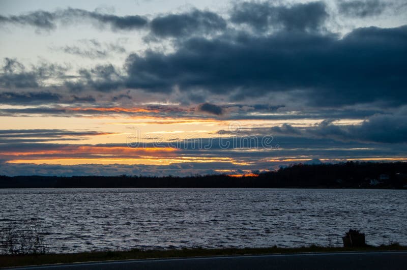 Beautiful Bright Sunset Sky Over a Serene Lake Stock Image - Image of ...