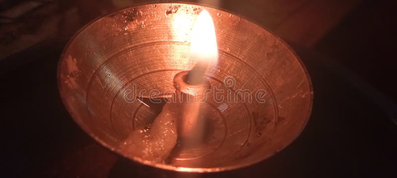 Beautiful Bronze Oil Lamp Burning in Dark with Blur Background. Stock ...