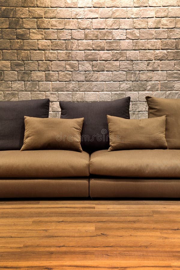 Beautiful Brown Fabric Sofa on Wooden Floor with Brick Wall Stock Photo ...
