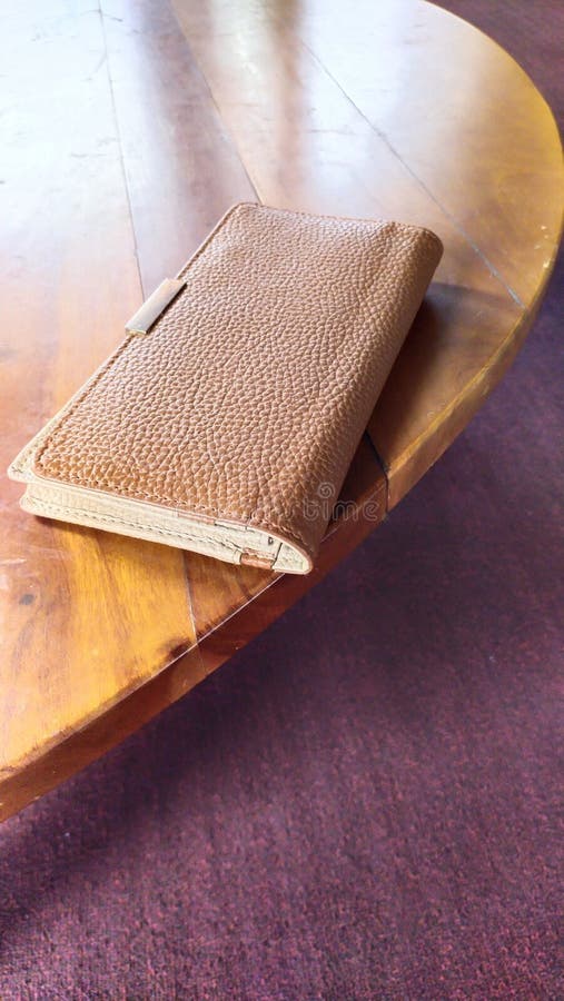Beautiful Brown Wallet on the Dining Table Stock Photo - Image of ...