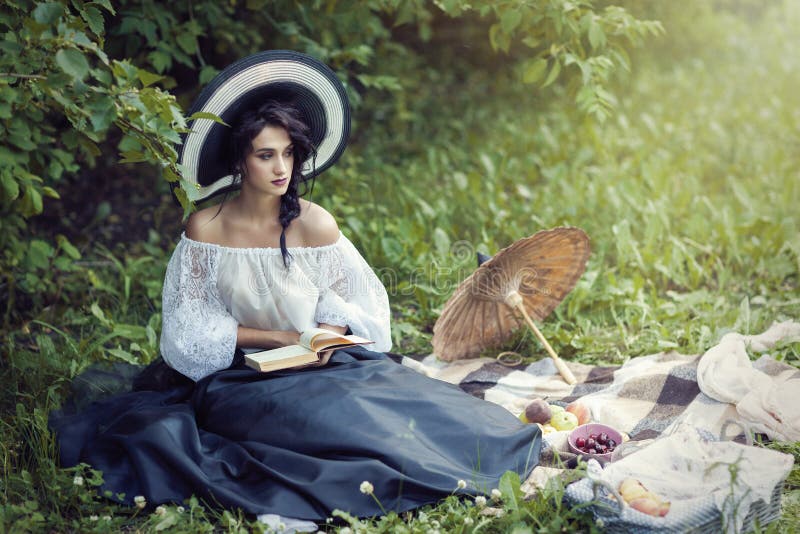 Beautiful Brunette in Dress Reading a Book Stock Image - Image of ...