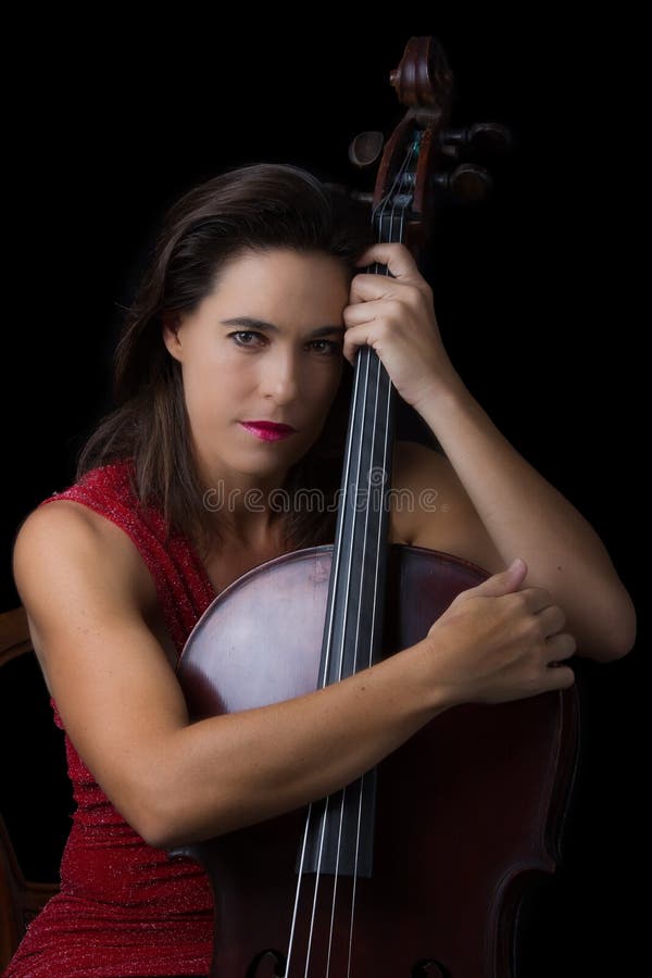 Beautiful Brunette Holding Cello in Red Dress Stock Image - Image of ...