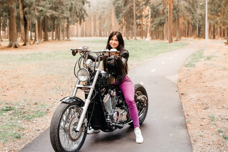 Beautiful Brunette Riding a Motorcycle in the Park Stock Image - Image ...