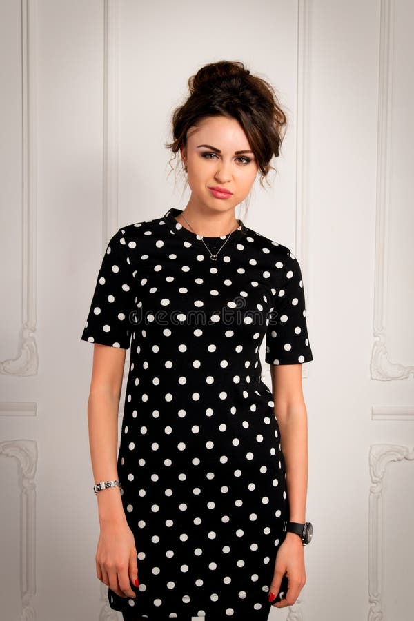 Beautiful Brunette Woman with Angry Expression in a Black Dress Stock ...