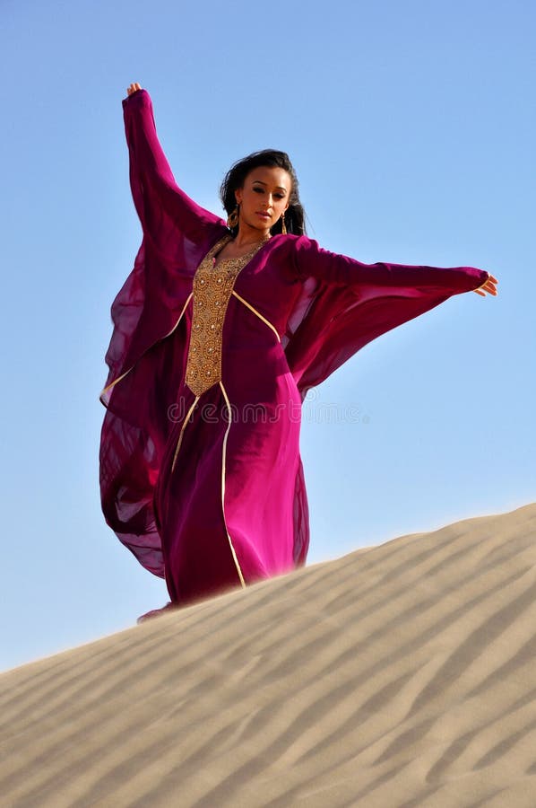Beautiful Brunette Woman Posing in Arabic Desert Stock Photo - Image of ...