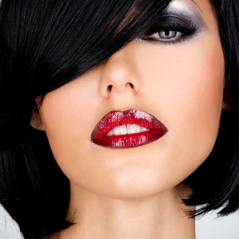 Beautiful Brunette Woman With Shot Hairstyle And Red Lips Stock Image