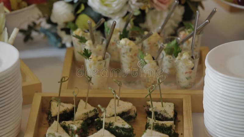 Beautiful Buffet Table with Sandwiches. Stock Footage - Video of dining ...