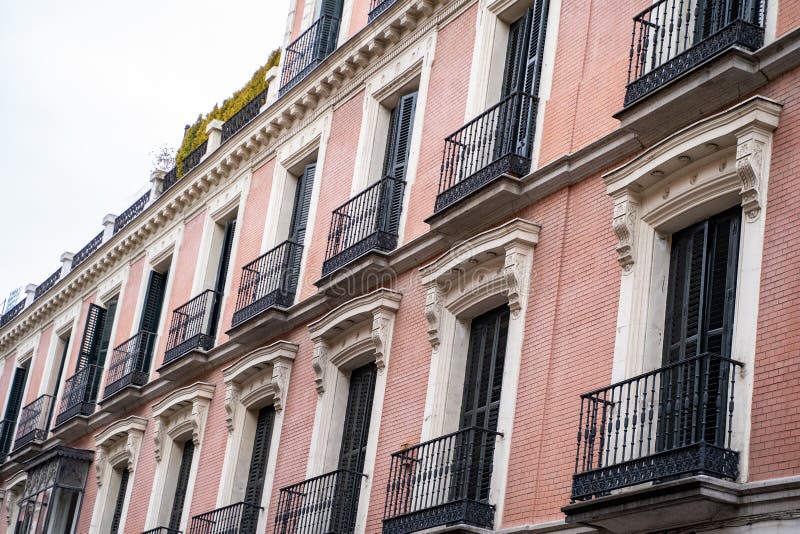 Beautiful Building with Pink Facade and Balconies in Madrid Spain Stock ...