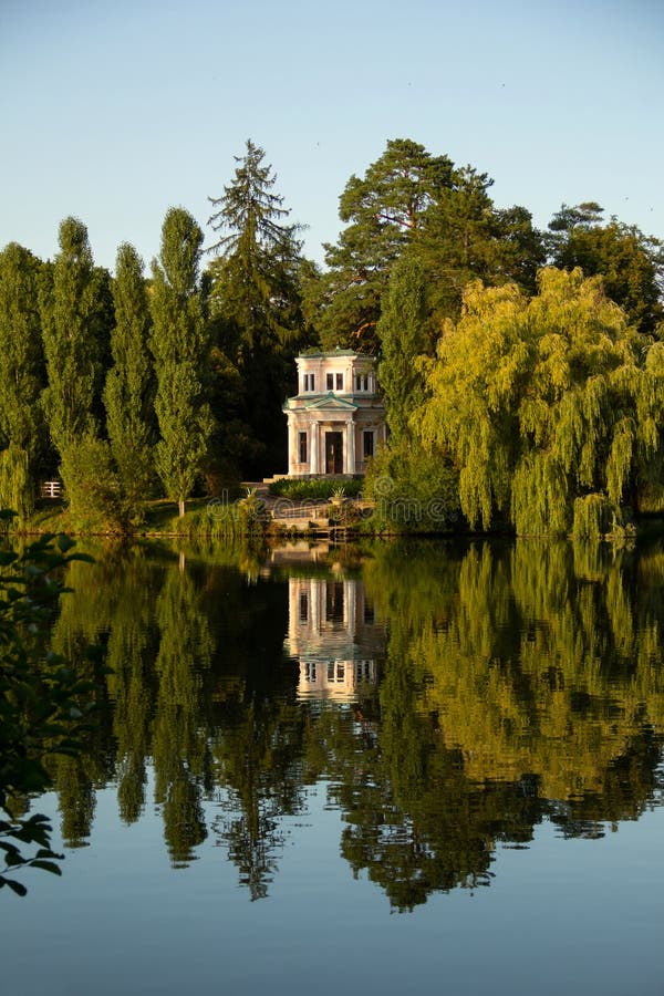 Building Reflected in the Water Stock Photo - Image of building, water ...