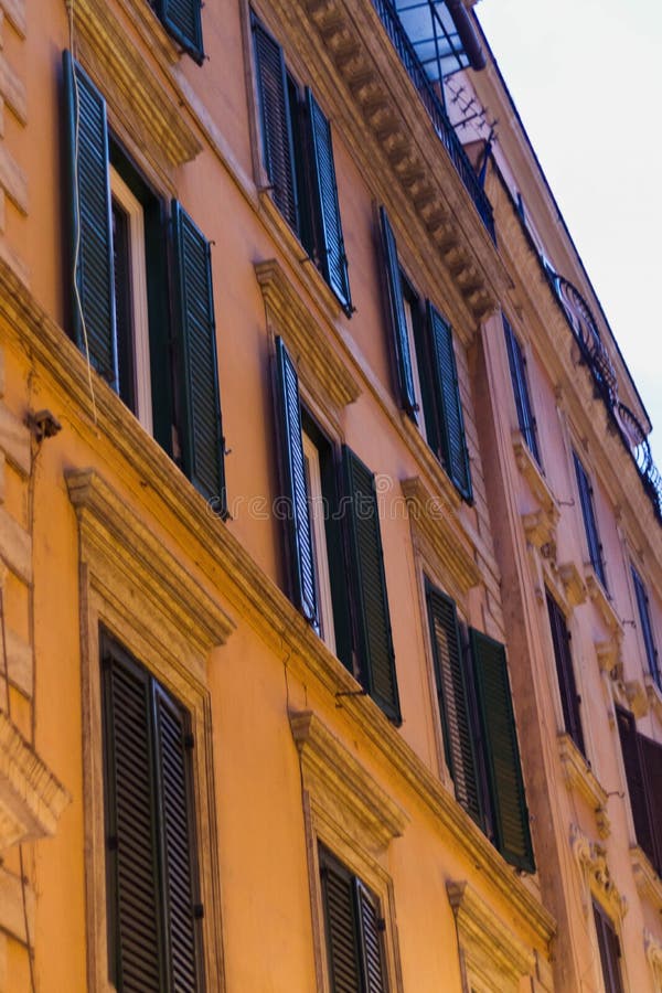 Beautiful Building with Windows Under the Lights during the Evening in ...