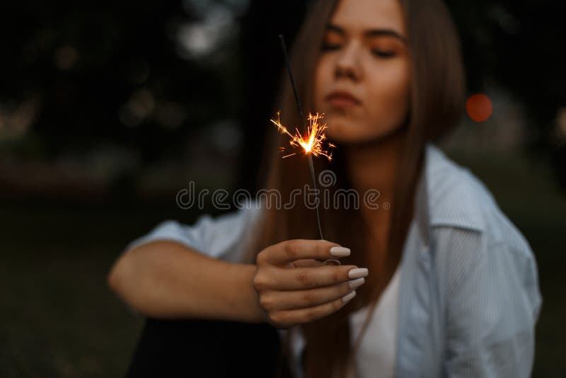 Beautiful Burning Bengali Fire with Sparks in Female Hands Stock Photo ...