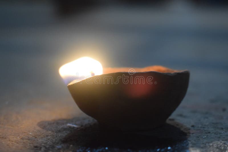 A Beautiful Burning Light Made with Mud Stock Image - Image of burner ...