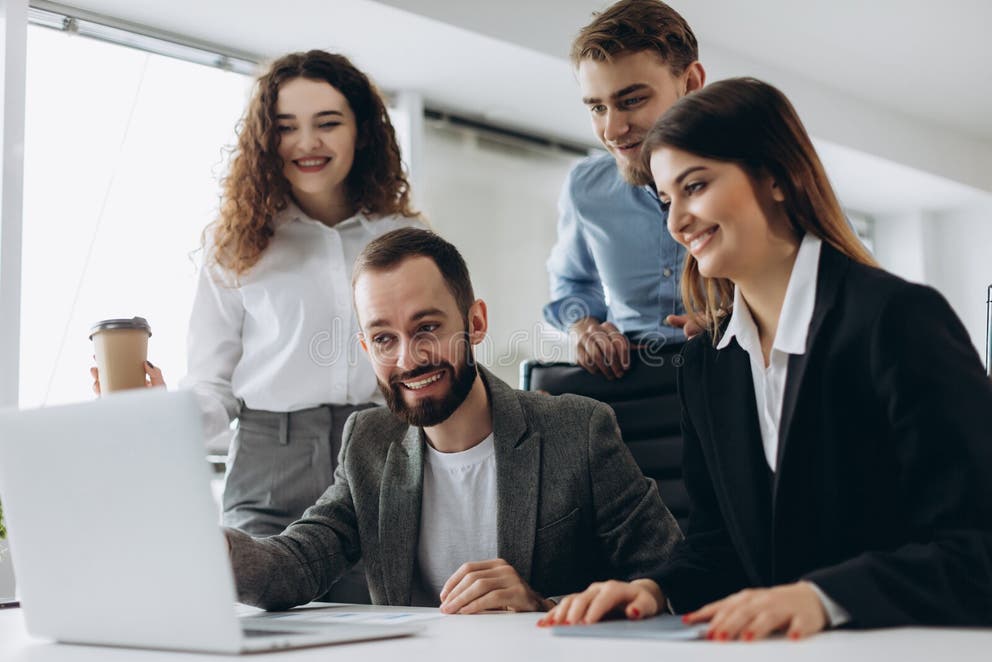 Beautiful Business People are Using Computers and Smiling while Working ...
