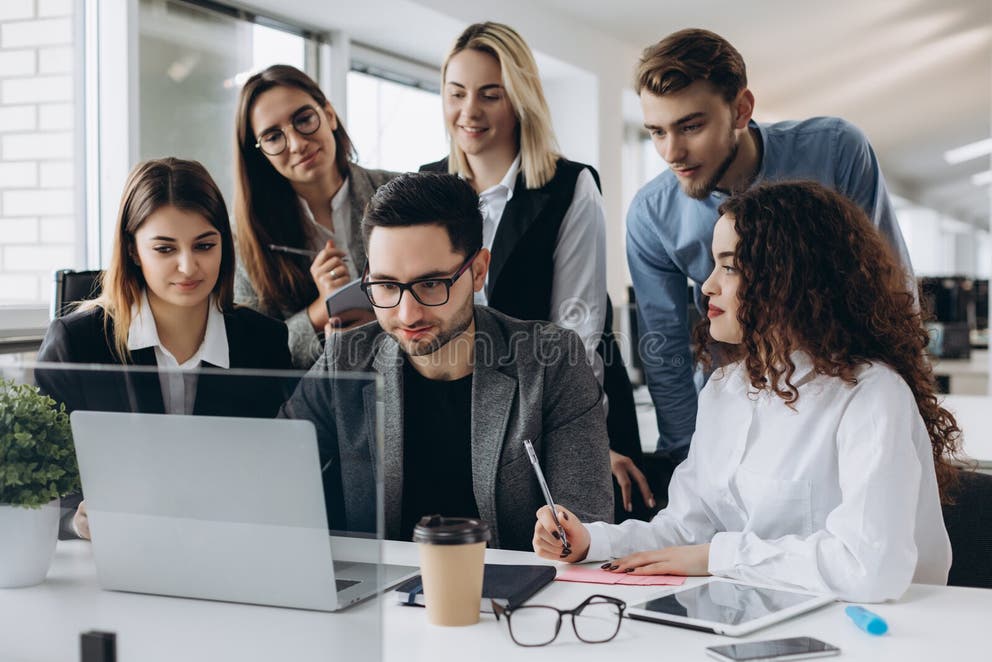 Beautiful Business People are Using Computers while Working in Modern ...