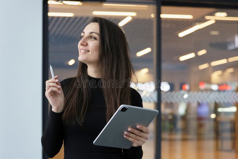 Beautiful Business Woman in Office Using Tablet Computer Texting ...