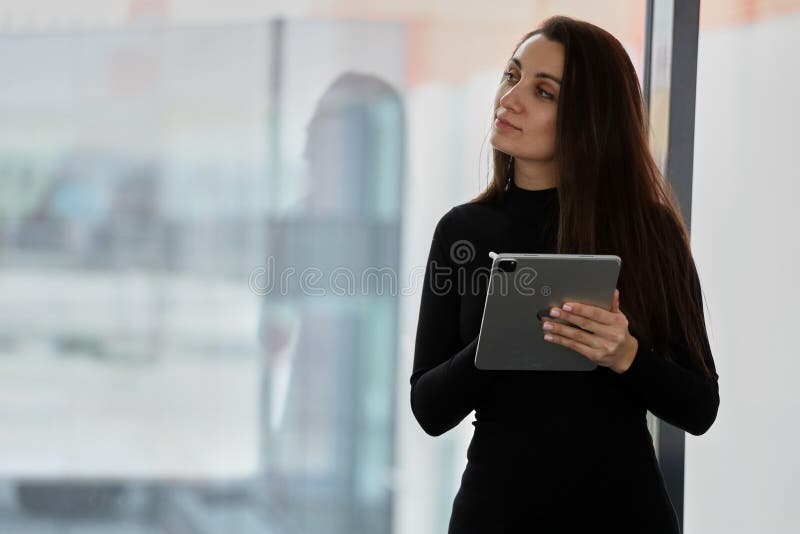 Beautiful Business Woman Using Tablet Computer Texting while Walking in ...