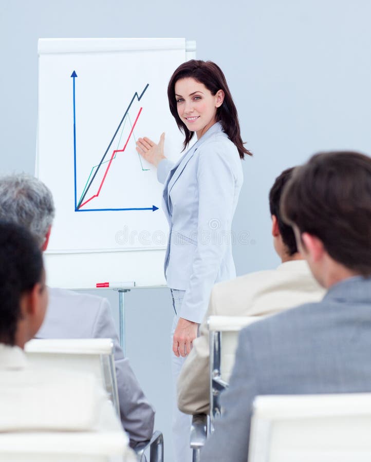 Beautiful Businesswoman Reporting Sales Figures Stock Photo - Image of ...