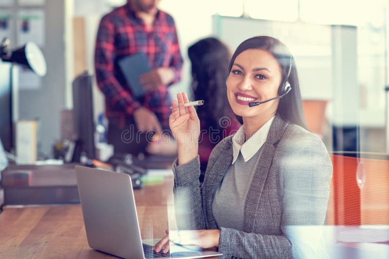 Beautiful Call Center Agent Browsing the Internet on Her Computer Stock ...