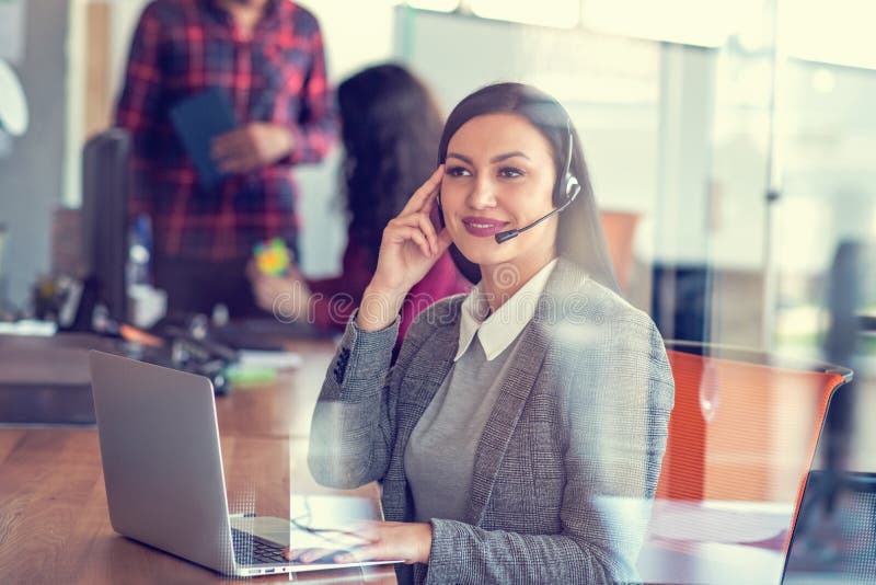 Beautiful Call Center Agent Browsing the Internet on Her Computer Stock ...