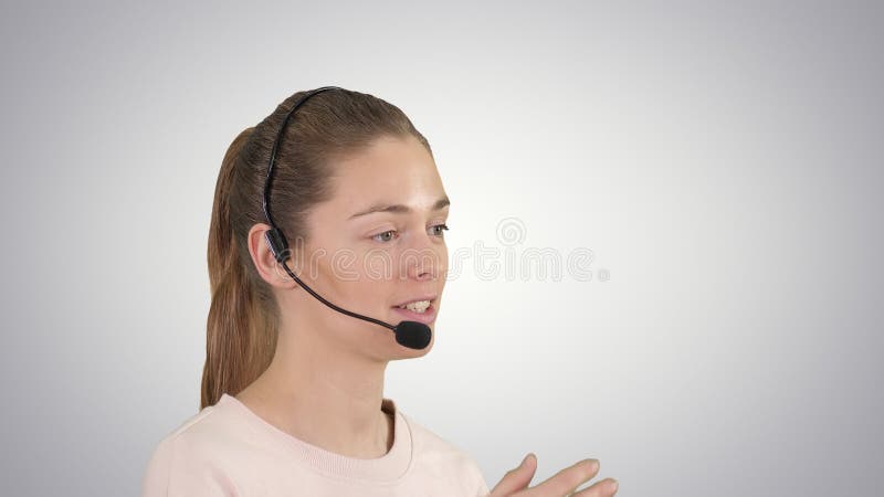 Beautiful Call Center Operator with Headset Talking on Gradient ...