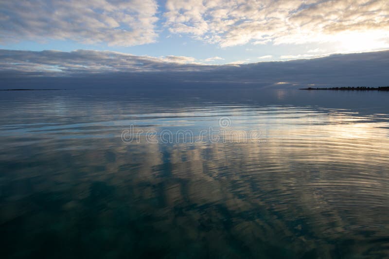 Beautiful Calm Sea and Cloud Reflection in the Water Stock Photo ...