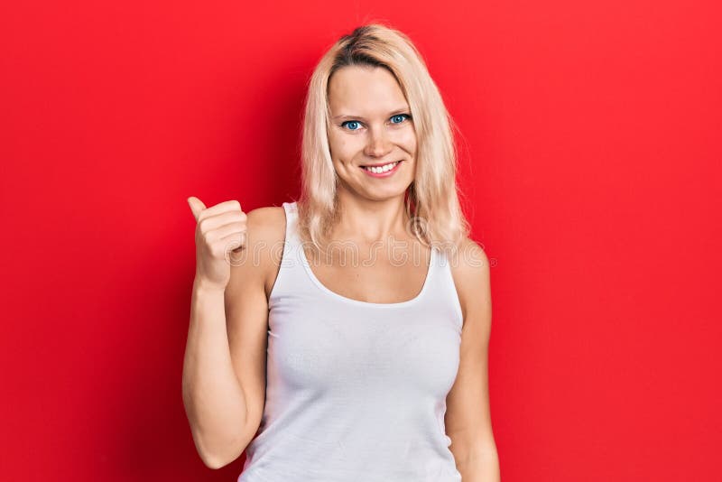 Beautiful Caucasian Blonde Woman Wearing Casual White T Shirt Smiling