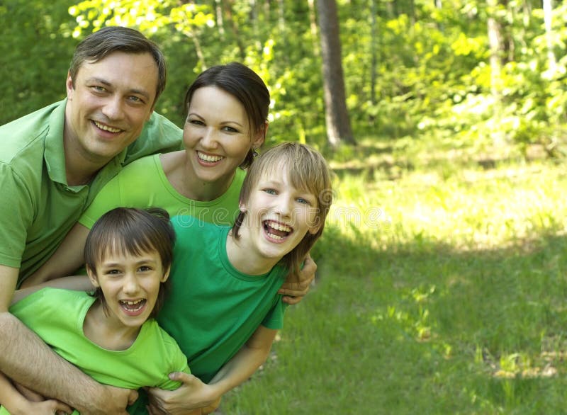 Beautiful Caucasian Family of Four Stock Image - Image of four, game ...
