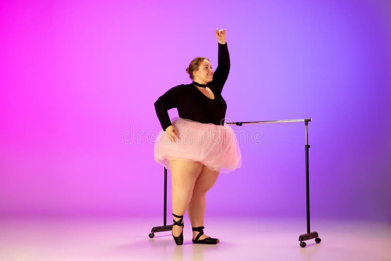 Beautiful Caucasian Plus Size Model Practicing Ballet Dance on Gradient ...