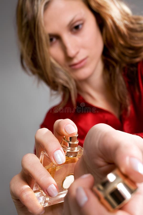 Beautiful Caucasian Woman Spraying Perfume Stock Photo - Image of lady ...