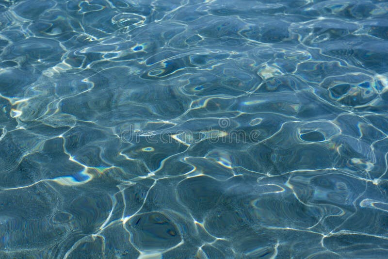 Bright Caustics on Water Surface in Blue Sea Stock Image - Image of ...