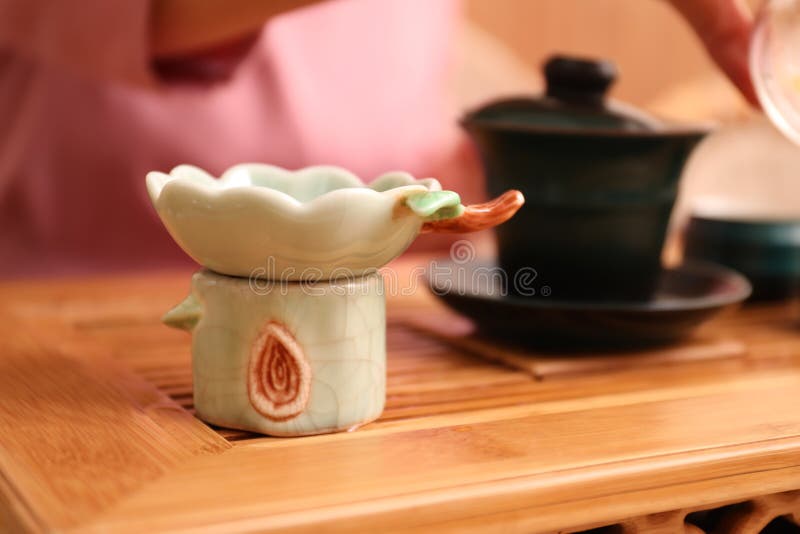 Beautiful Ceramic Filter for Traditional Tea Ceremony on Wooden Stand ...