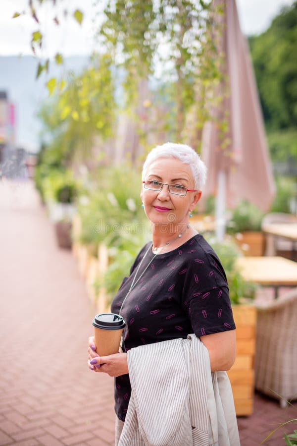 Beautiful Charming Woman Holding Plastic Cup and Jacket Stock Image ...