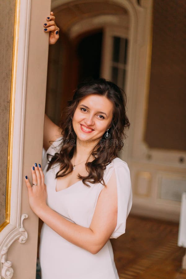 Beautiful and Cheerful Young Bride Posing in Luxurious Vintage Interior ...