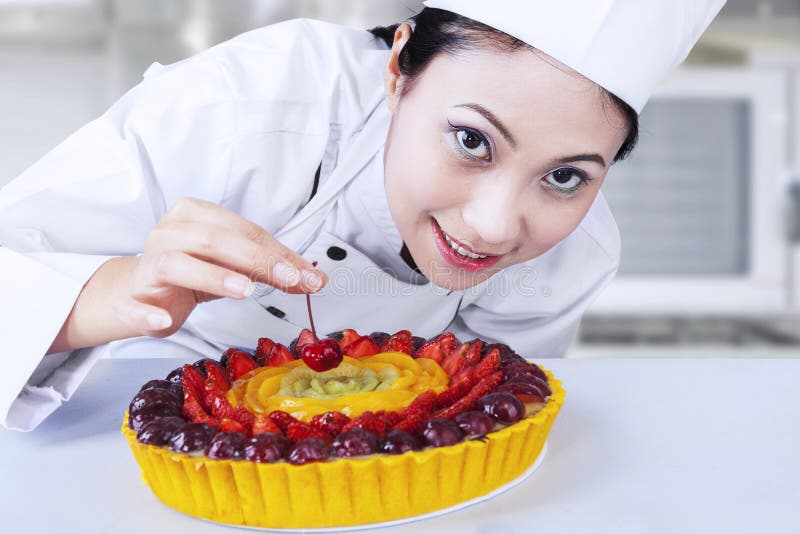 Beautiful Chef Decorating Delicious Cake Stock Image - Image of grape ...