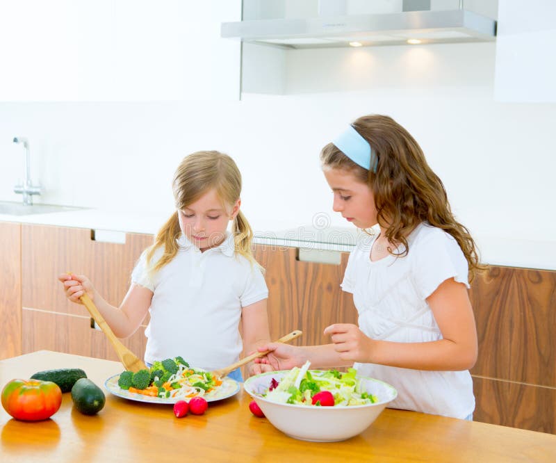 Beautiful Chef Sisters at Kitchen Preparing Salad Stock Image - Image ...