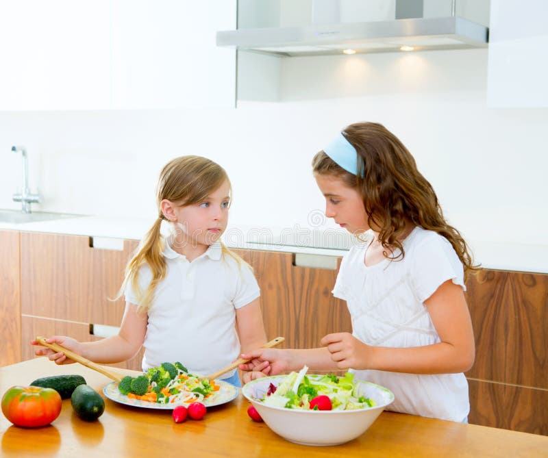 Beautiful Chef Sisters at Kitchen Preparing Salad Stock Image - Image ...