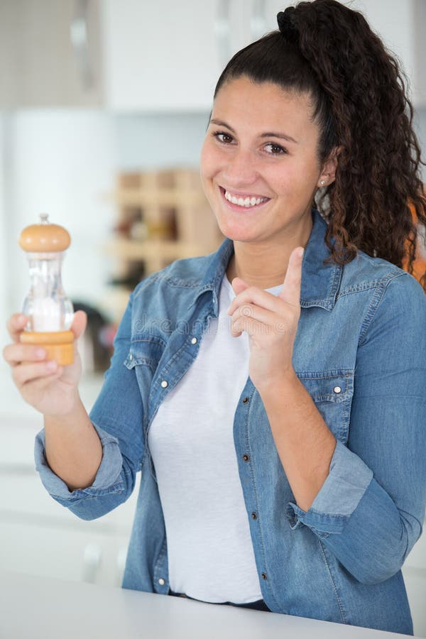 Beautiful Chef Woman Holding Salt while Smiling at Camera Stock Image ...