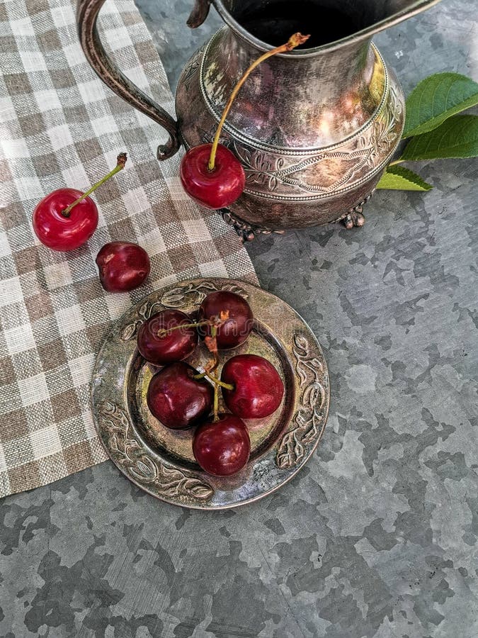 Beautiful Cherry on the Table and on the Saucer. Cherries and Cherry ...