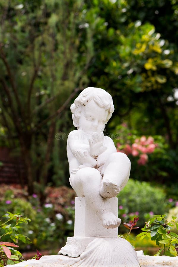Beautiful Cherub statue stock image. Image of faith, natural - 32130497