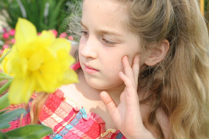 Beautiful Child Looking at Flowers Stock Photo - Image of pink, youth ...