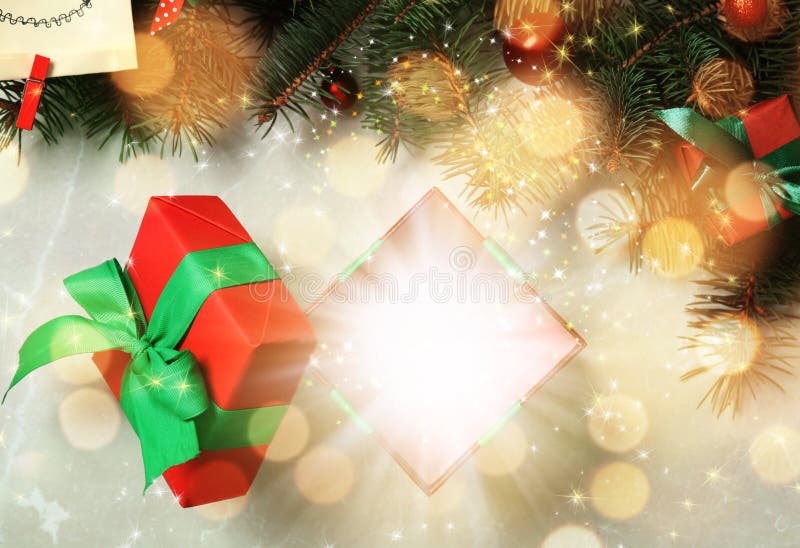 Beautiful Christmas Gift Box with Magic Light on Table, Top View Stock ...