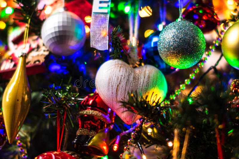 Beautiful Christmas Ornaments and Lights Hanging in the Christmas Tree ...