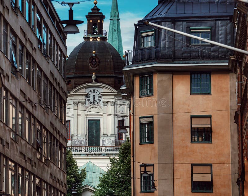 Beautiful Church Visible between Two Buildings Stock Photo - Image of ...