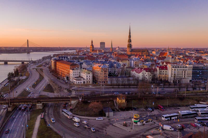 Beautiful Cityscape of Riga Surrounded by Buildings during the Sunset ...
