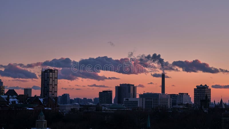 Beautiful Cityscape with Skyscrapers Under the Sunset Sky Stock Photo ...