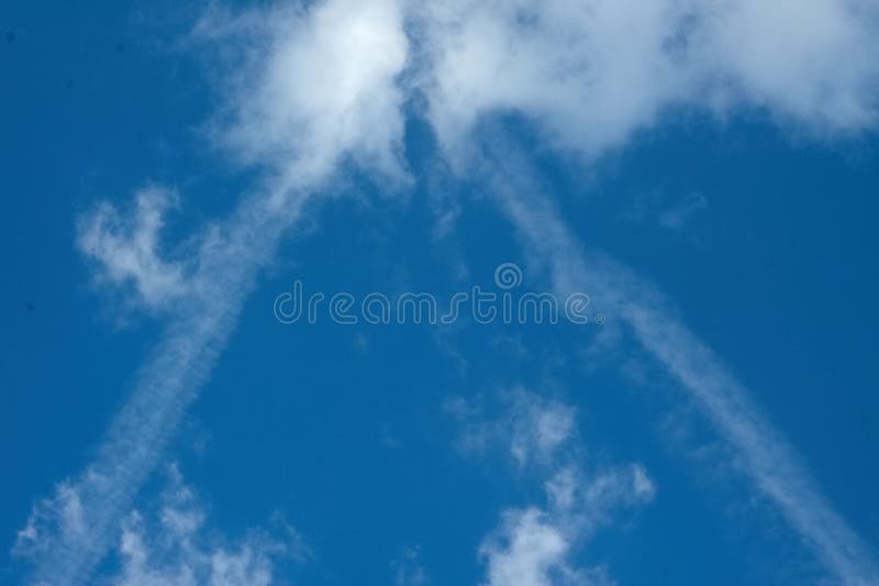 Beautiful Clouds with Contrails in the Clear Blue Sky Stock Photo ...