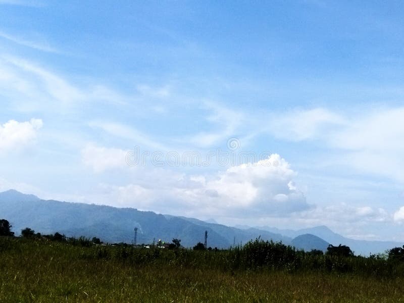Beautiful Clouds with Mountain Views and White Cloud Grass Stock Image ...