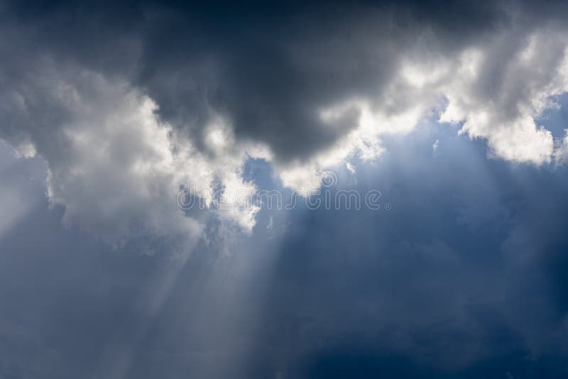Beautiful Cloudscape with Sun Rays Shining through the Clouds Stock ...